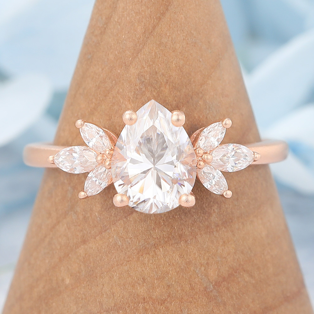 How to Style Your Pear Shaped Moissanite Ring with Other Rings ...
